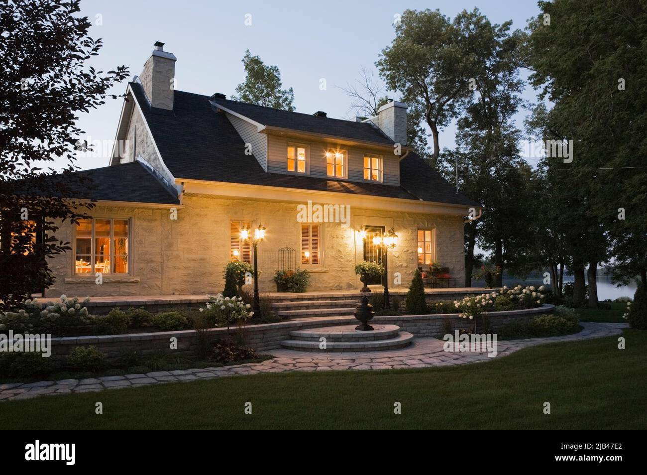 Old circa 1840 Canadiana style home with coat of grey cement applied ...