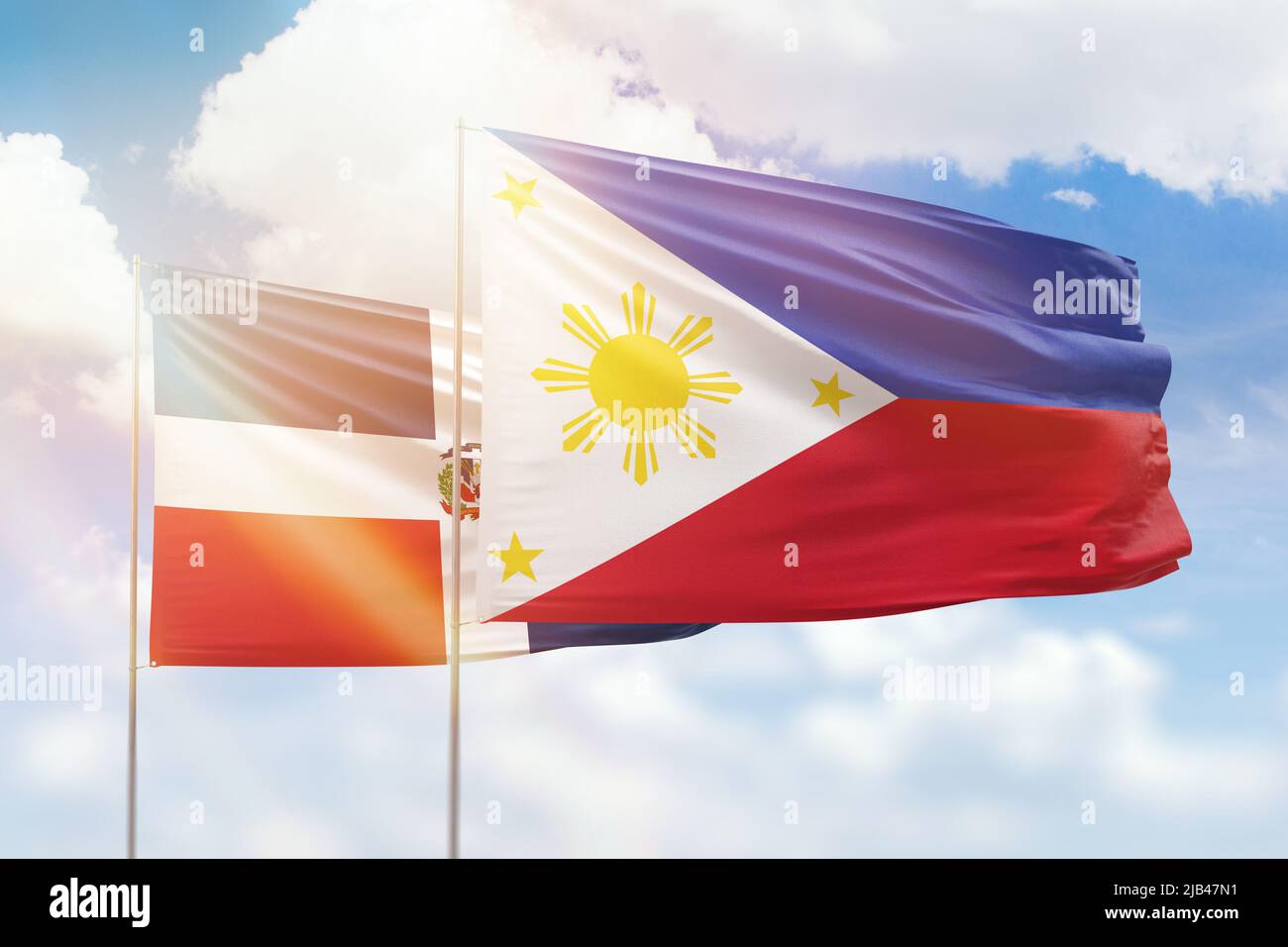 Sunny blue sky and flags of philippines and dominican republic Stock ...