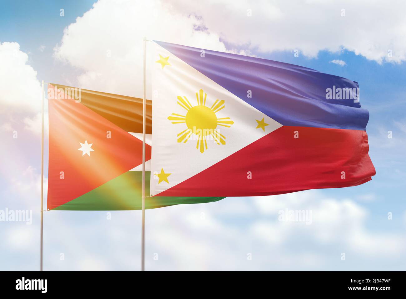 Sunny blue sky and flags of philippines and jordan Stock Photo - Alamy