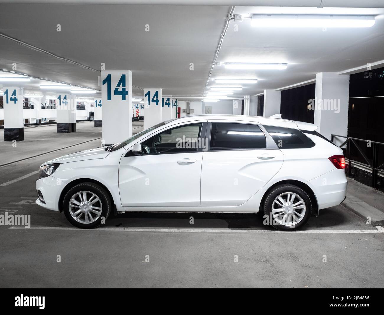 Moscow. Russia. September 15, 2021. Side view of a white car Lada Vesta SW, made in the station ...