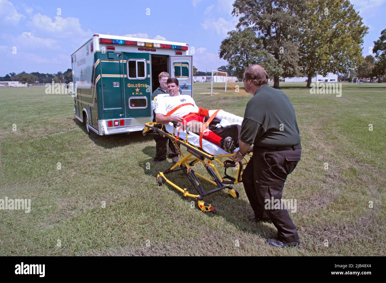 Soccer player, adult man with a broken leg is put in ambulance on ...