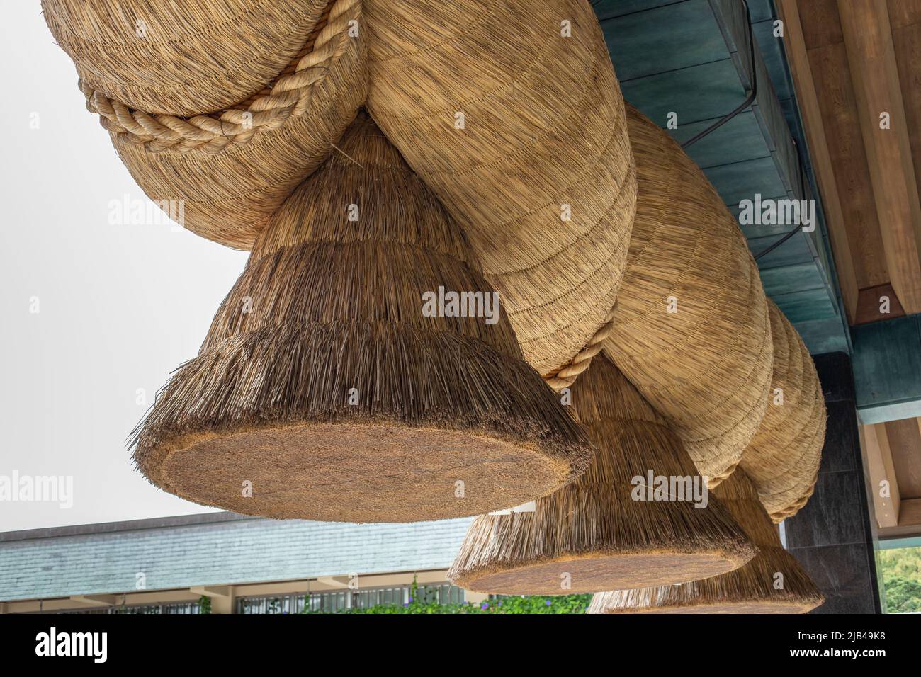 Closeup Shimenawa (enclosing rope) tied around Izumo Taisha Shrine ...