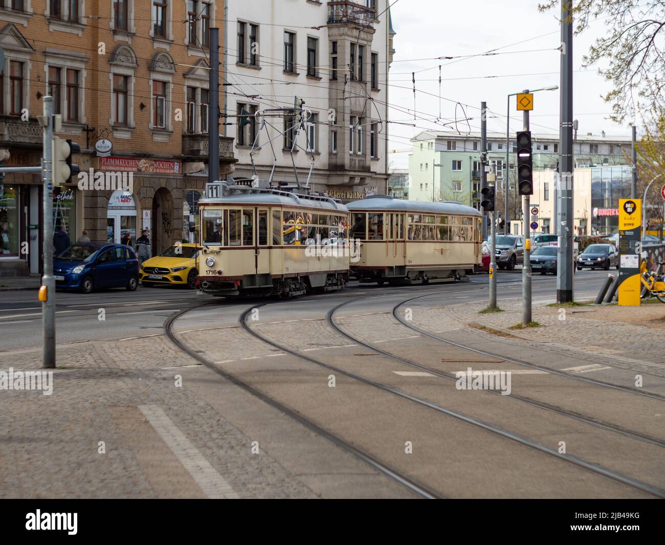 Historic old cable car in the city. Tram called Triebwagen 1716 driving ...