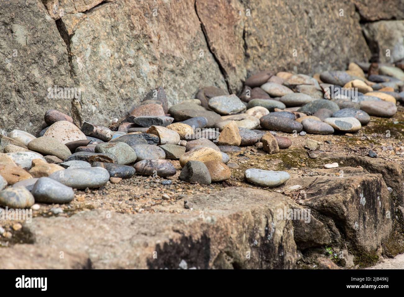 The closeup gravels on the ground near side gutter in the old Japanese ...