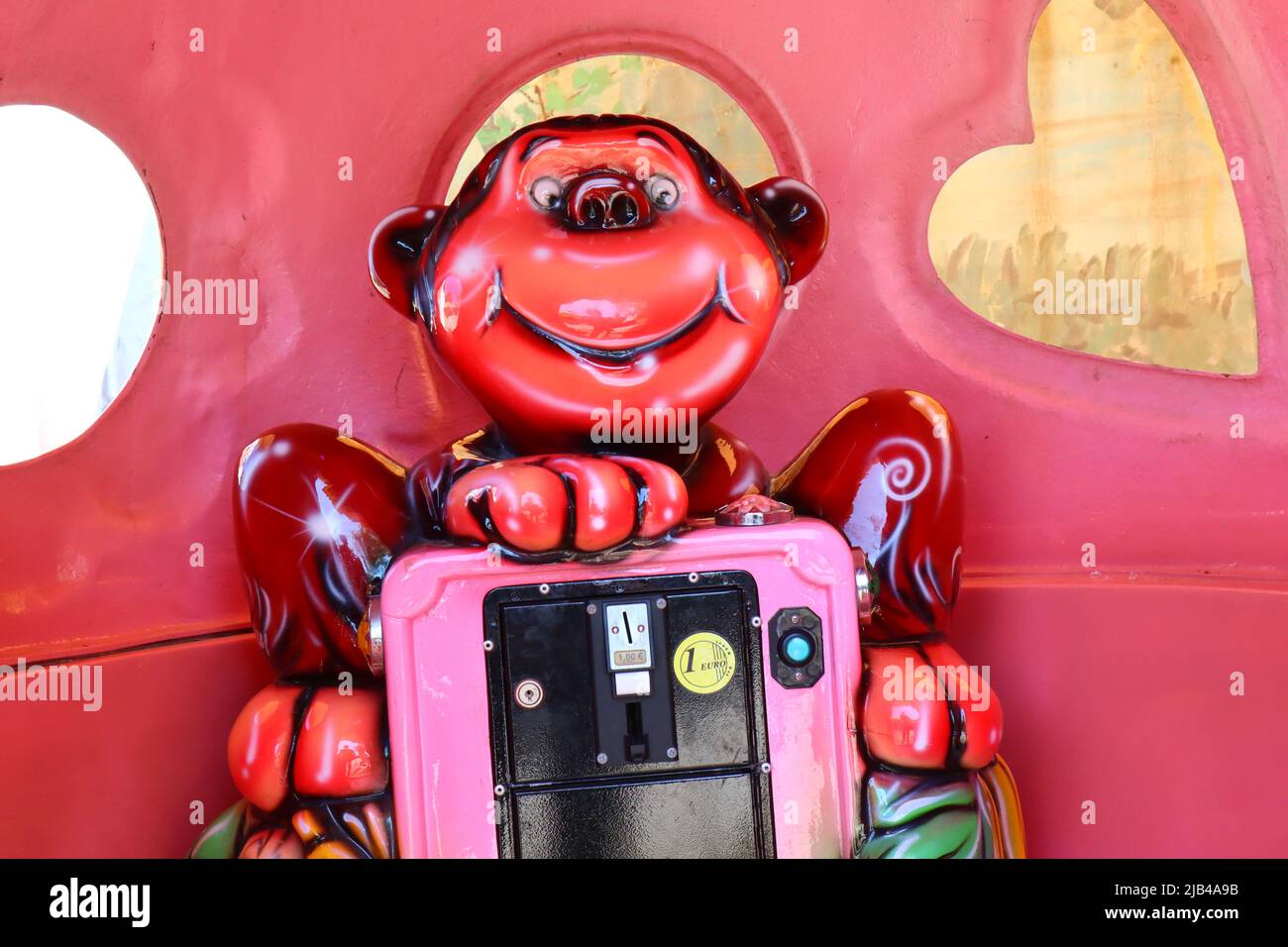 Coin operated amusement kiddie rides Stock Photo - Alamy