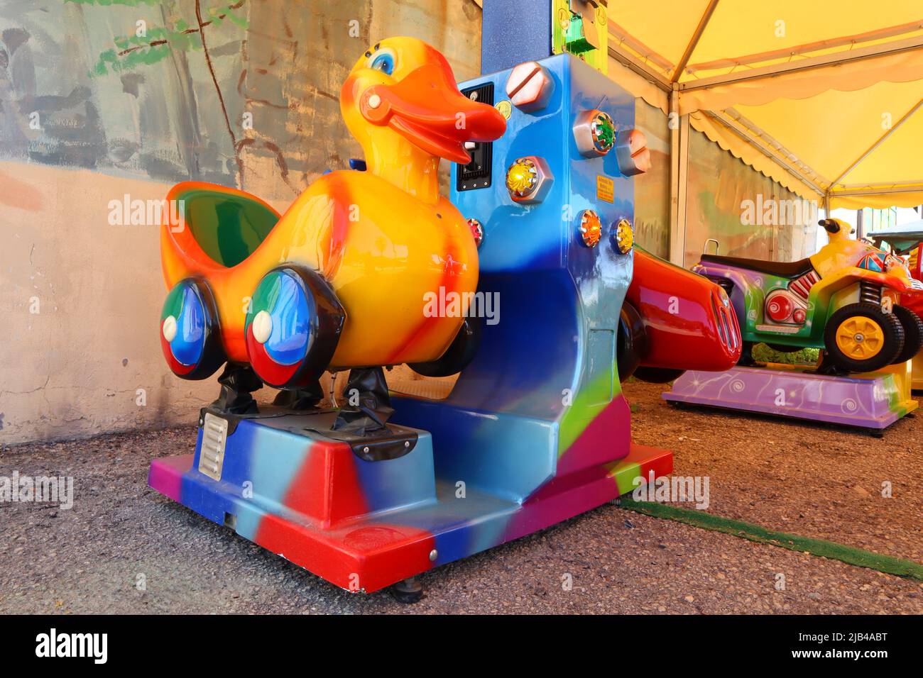 Coin operated amusement kiddie rides Stock Photo - Alamy