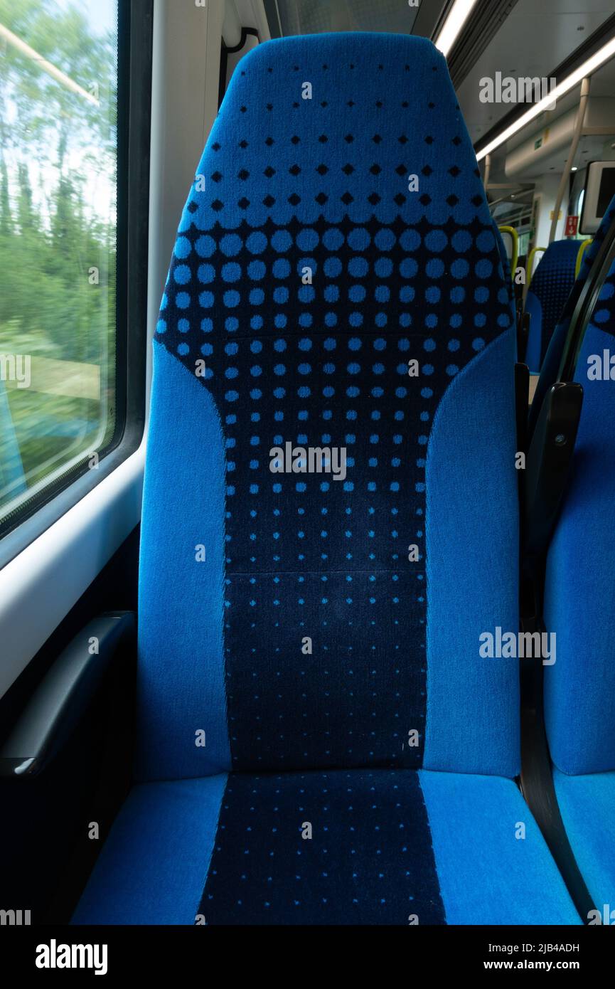single empty train seatand table on a UK train Stock Photo - Alamy