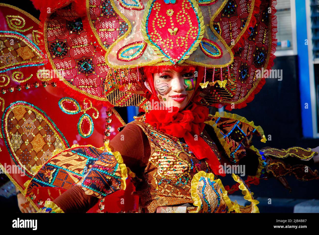 Javanese dancer in red at a native festival, Djokjakarta, Java Stock ...
