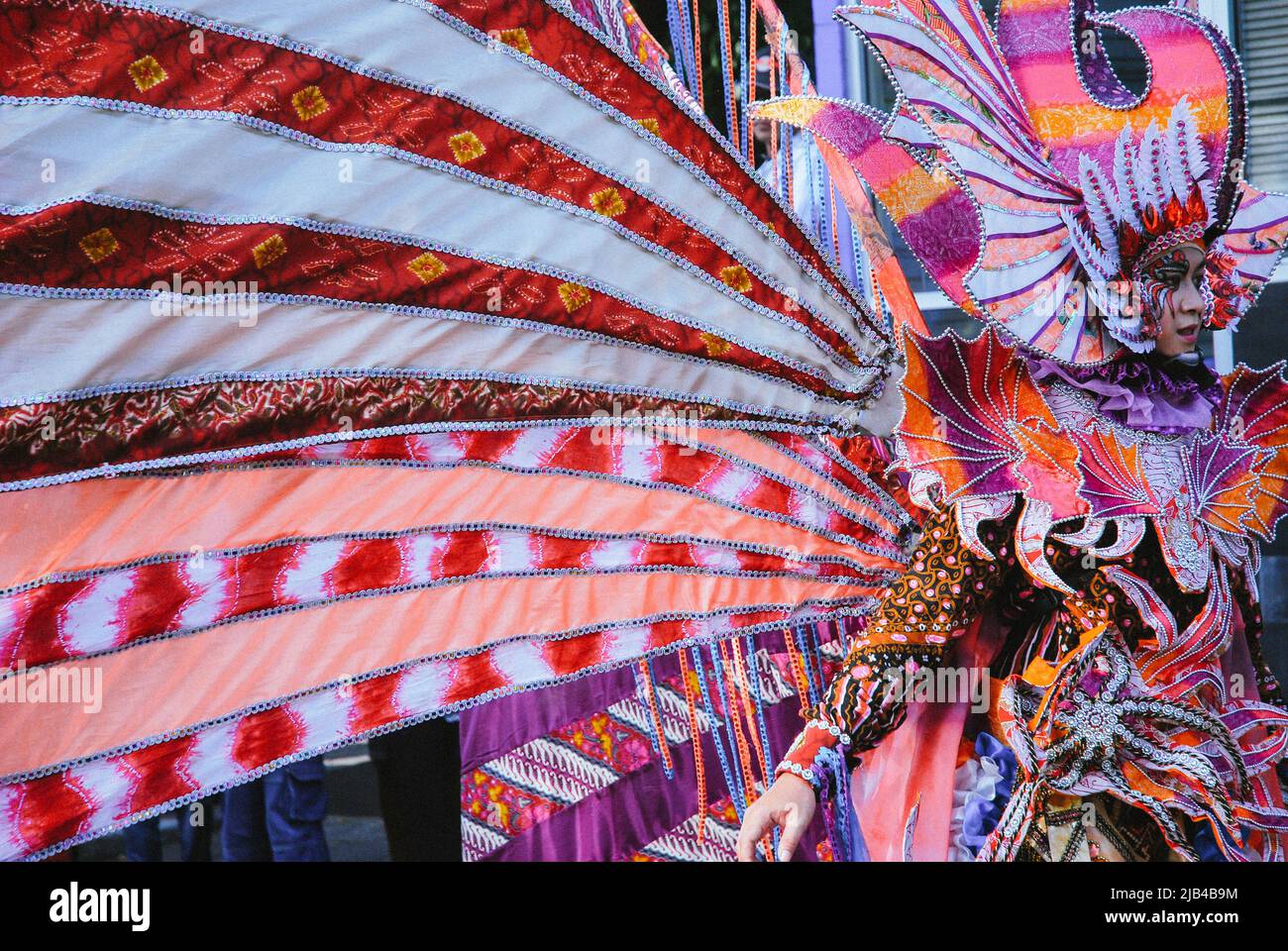 Javanese dancer in blue, purple, pink at a native festival, Djokjakarta ...