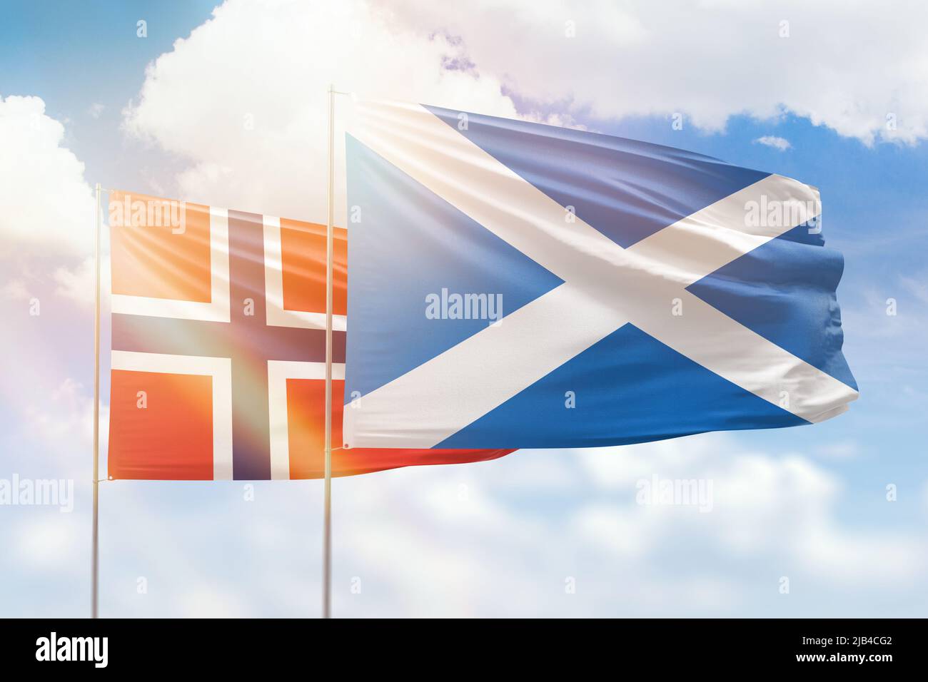 Sunny blue sky and flags of scotland and norway Stock Photo - Alamy