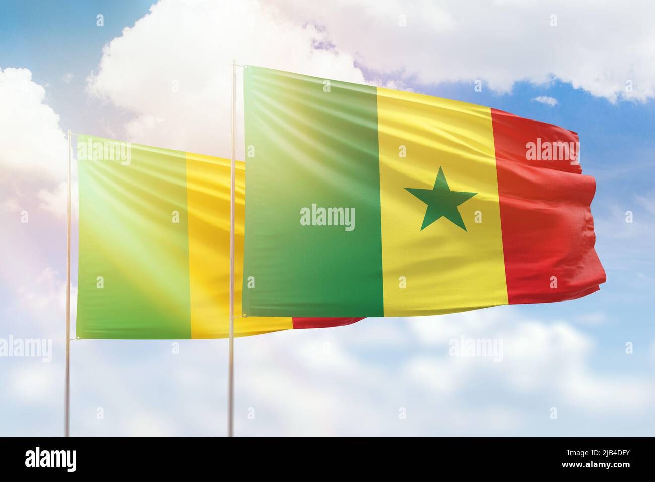 Sunny blue sky and flags of senegal and mali Stock Photo - Alamy