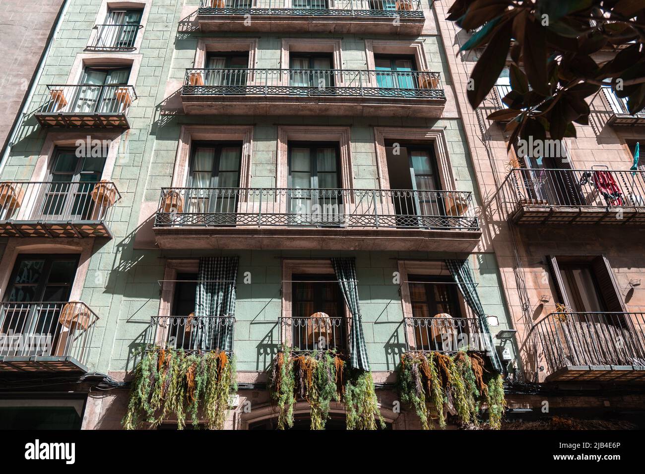 Classic apartment building with balconies and shutters in Barcelona ...