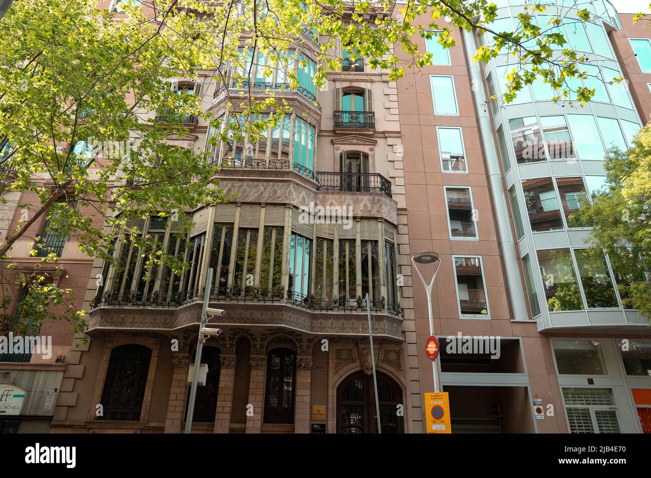 Classic apartment building with balconies and shutters in Barcelona ...
