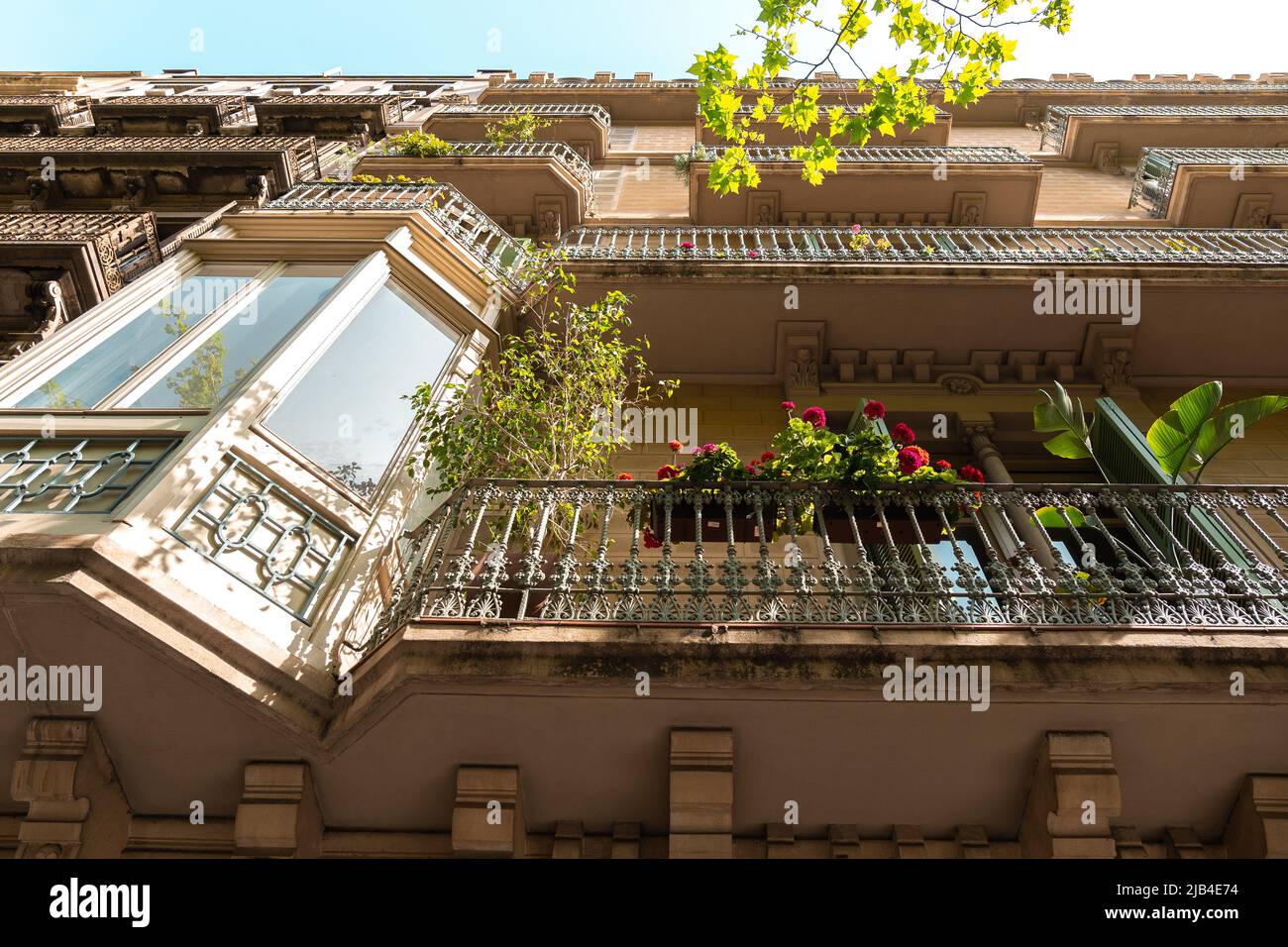 Classic apartment building with balconies and shutters in Barcelona ...
