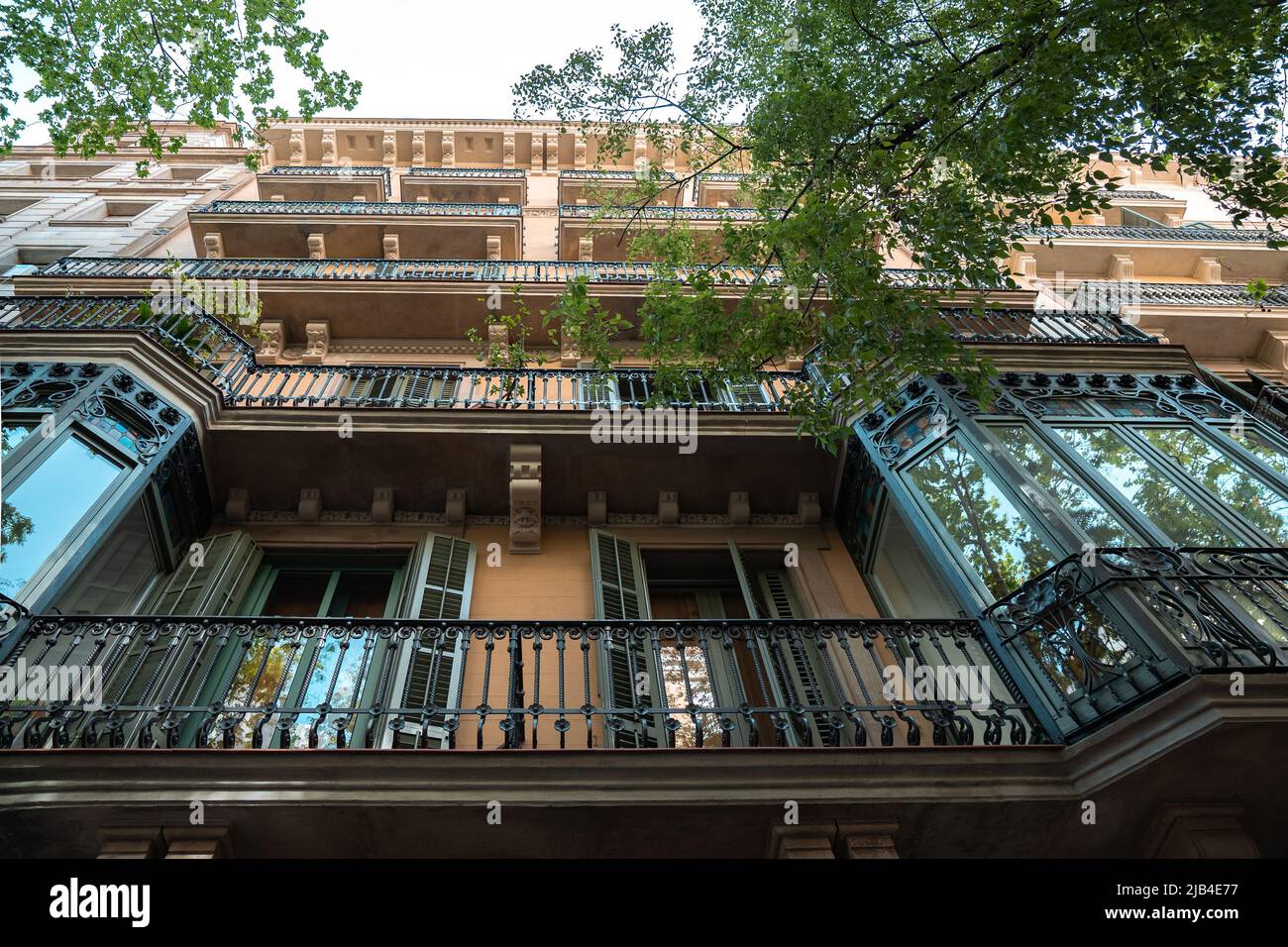 Classic apartment building with balconies and shutters in Barcelona ...
