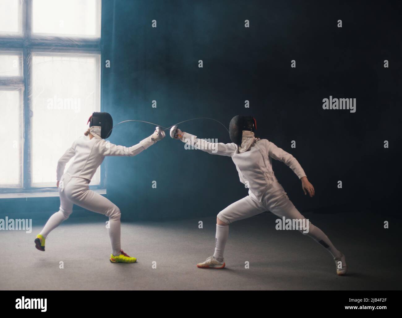 Duel women swords hi-res stock photography and images - Alamy