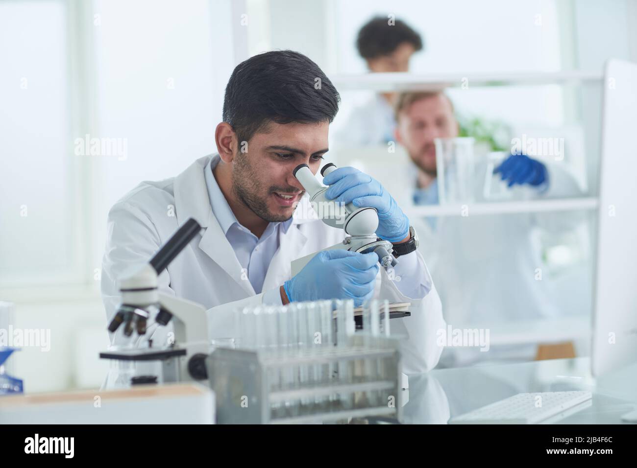 In a Modern Laboratory Research Scientist Conducts Experiments Stock ...