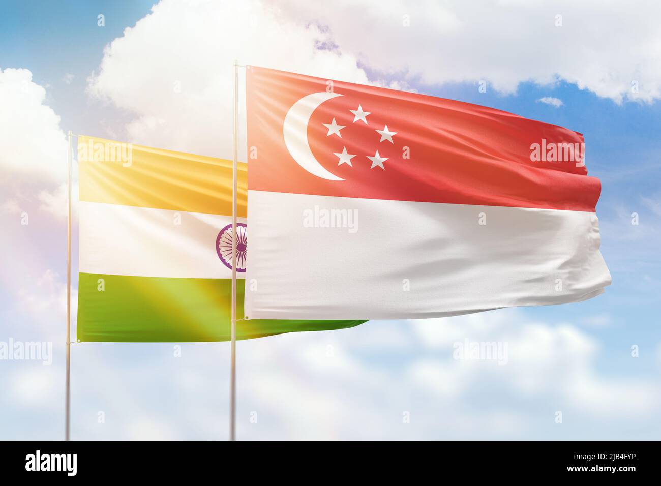 Sunny blue sky and flags of singapore and india Stock Photo - Alamy