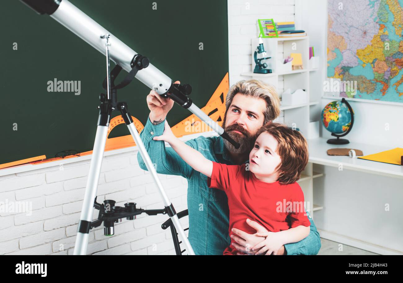Father teaching son. Kids Science education concept. Astronomy ...