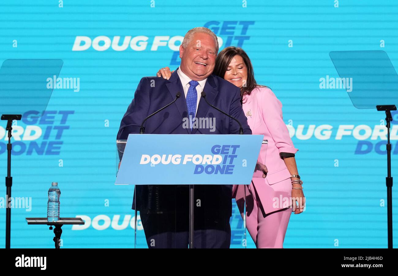 Ontario Premier Doug Ford and wife Karla embrace onstage after being re ...