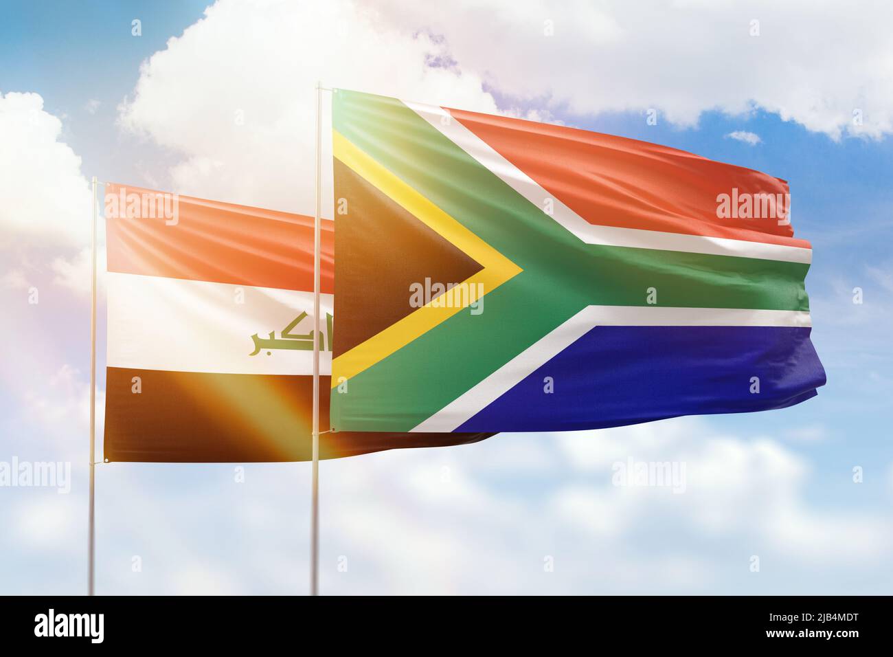 Sunny blue sky and flags of south africa and iraq Stock Photo - Alamy