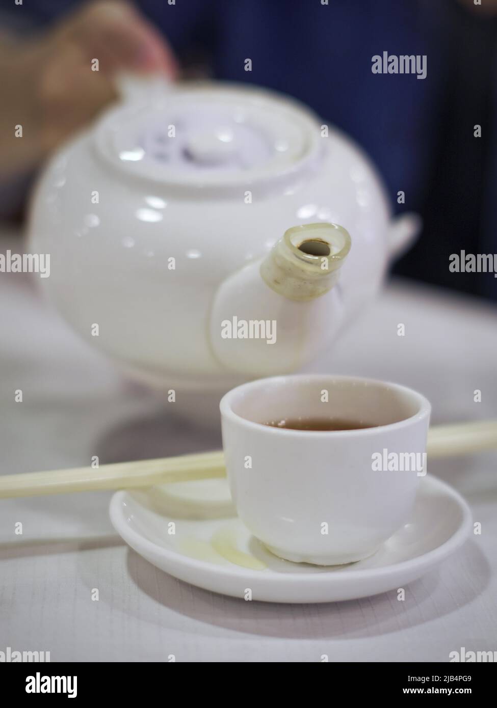 Having tea in a Chinese restaurant Stock Photo - Alamy