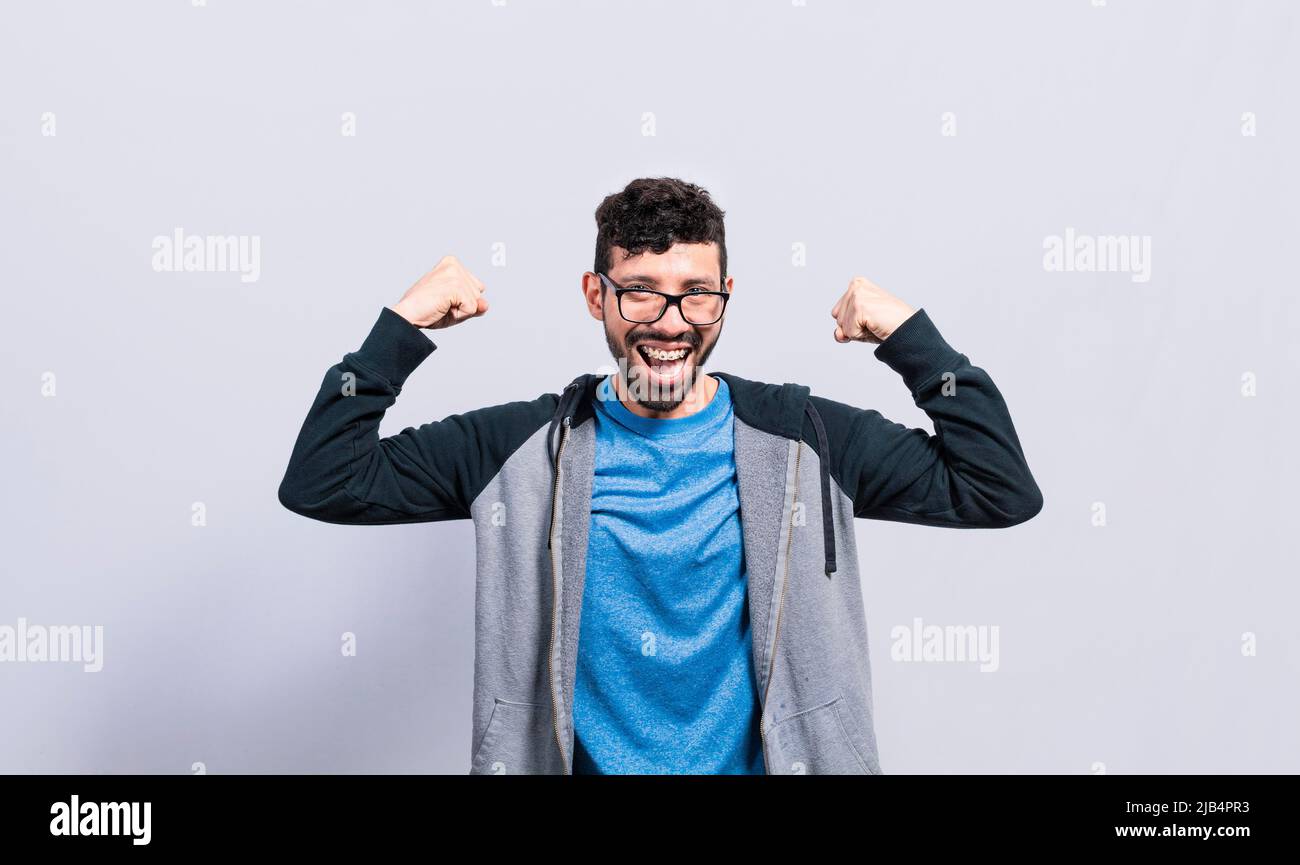 Person with Happy face raising arms in victory gesture isolated, winner ...