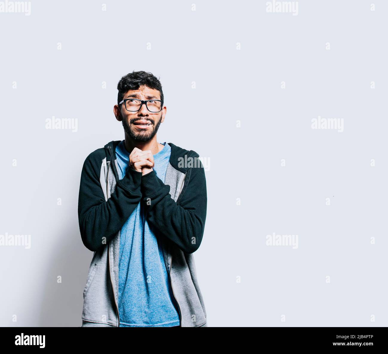 Person pleading with hands together isolated. distressed man asking for ...