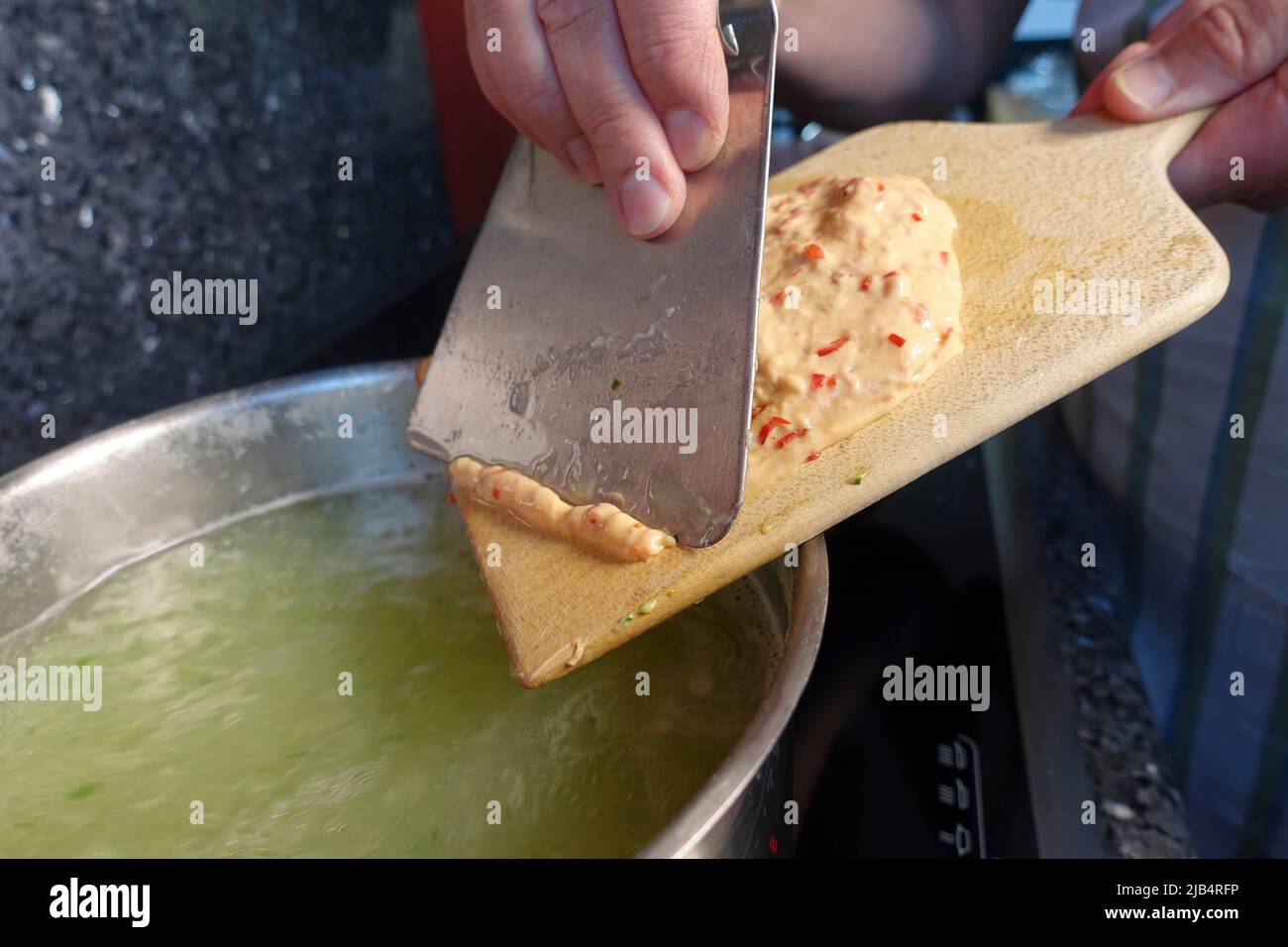 Swabian cuisine, preparation of hand-scraped spaetzle for spaetzle ...