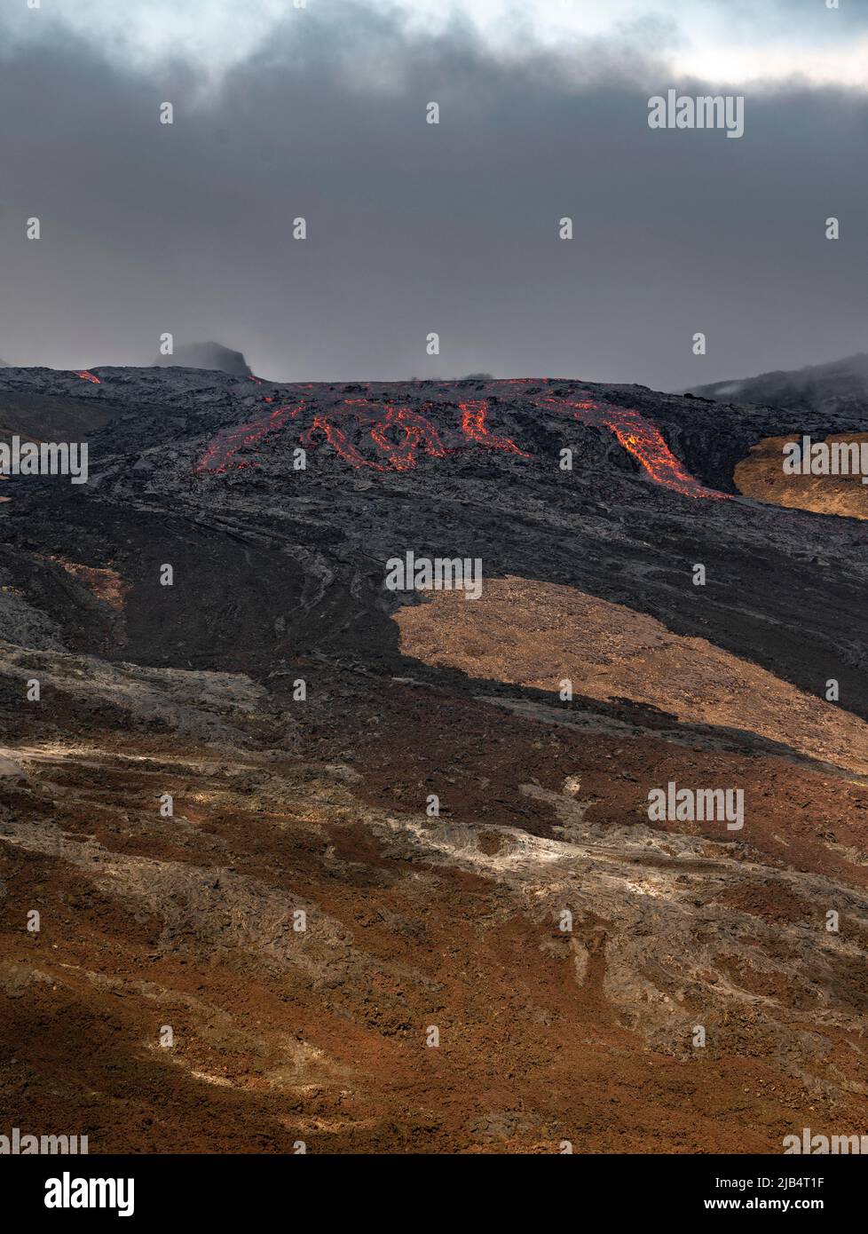 Glowing lava, lava flow, lava field, active table volcano ...