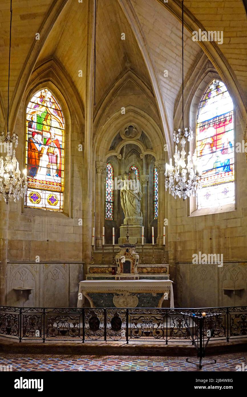Gothic chapel in the choir ambulatory with statue of the Virgin Mary ...