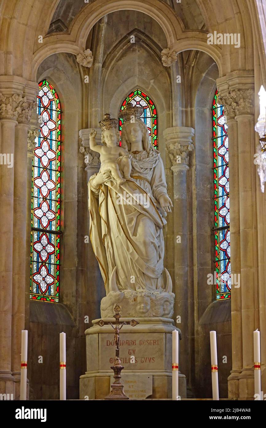 Gothic chapel in the choir ambulatory with statue of the Virgin Mary ...