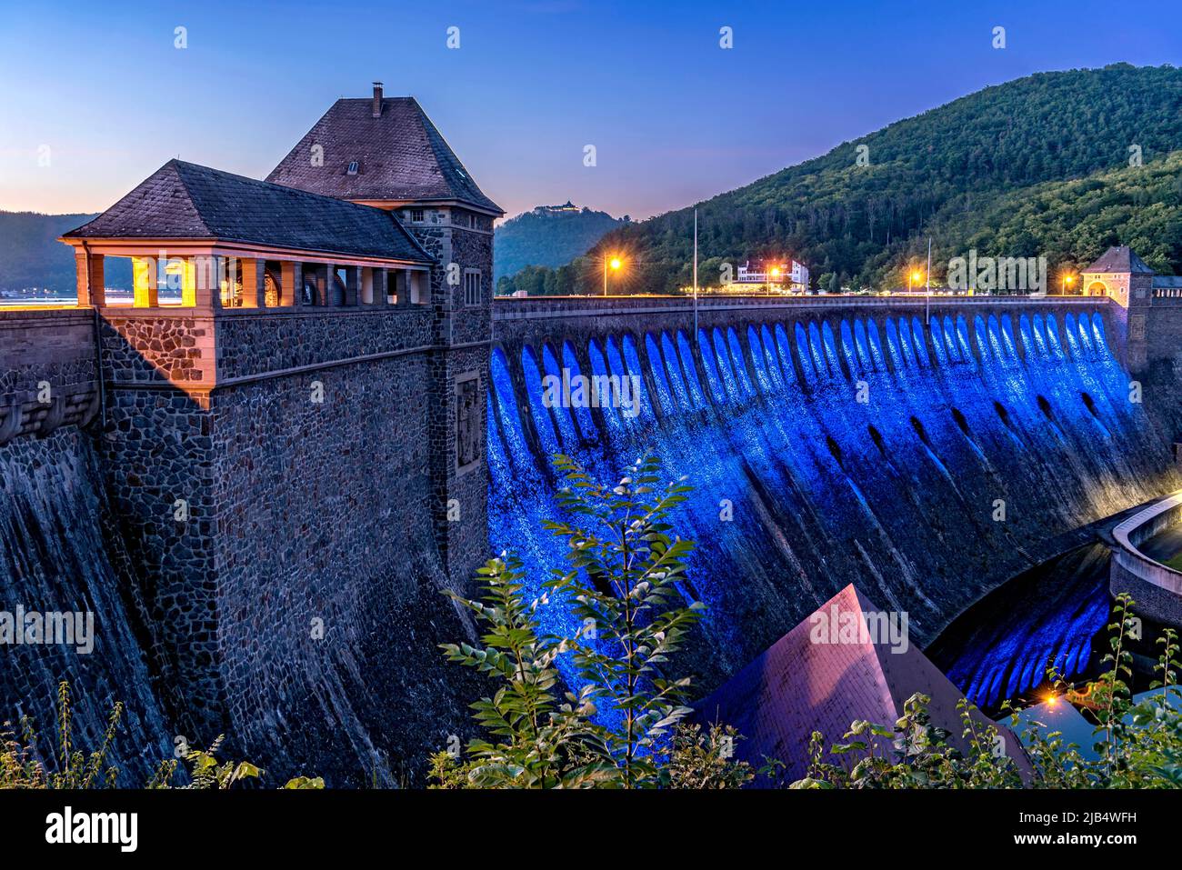 Dam in the evening light, illuminated in blue, dam wall of Edersee ...