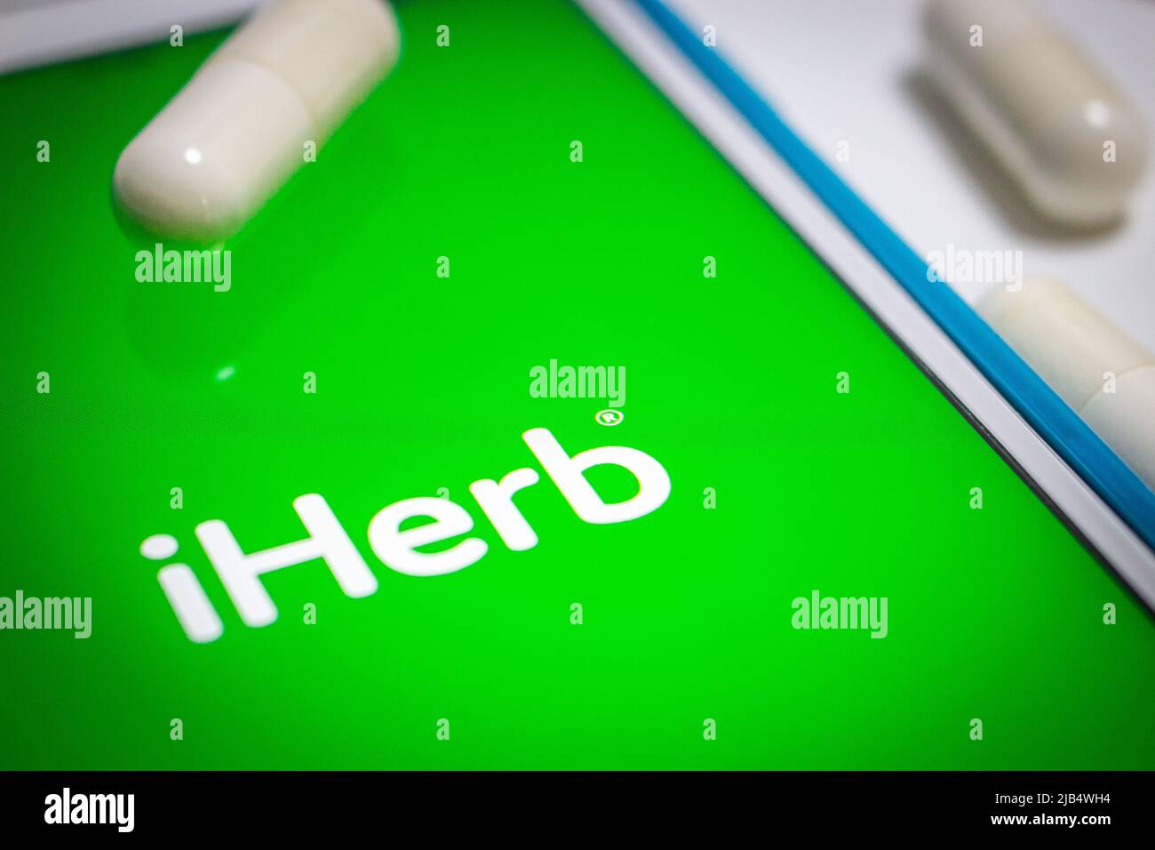 Kumamoto, Japan - Jul 23 2020 : Close up of iHerb logo on iPhone with ...