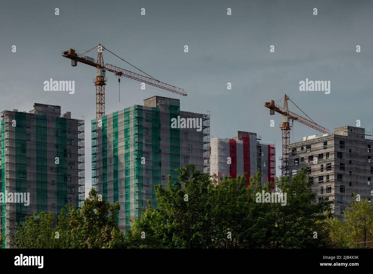 Construction site of a city block buildings or skyscrapers. Visible ...