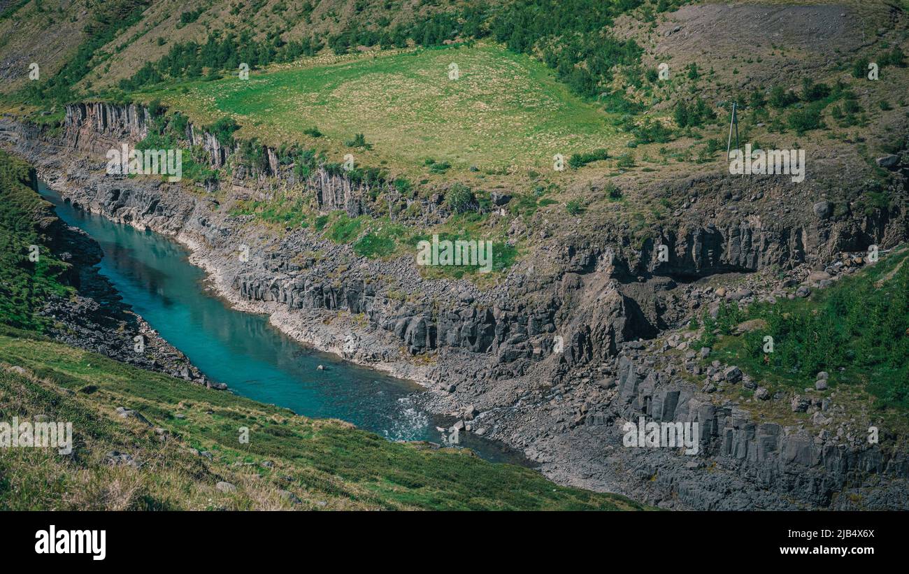 Aerial drone panorama of studlagil canyon in Iceland, picturesque valley with basalt columns ...