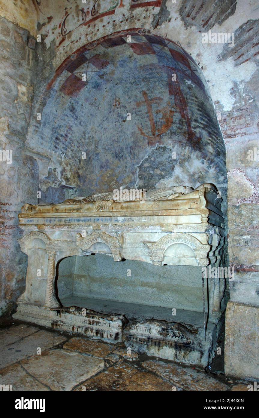 Broken open historical marble sarcophagus of Saint Nicholas in former ...