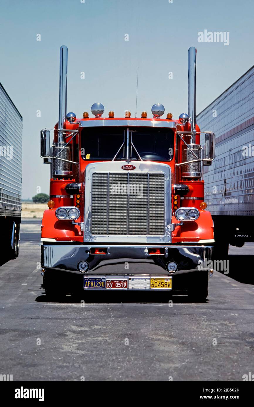 US truck, red, Peterbilt brand, on highway car park, USA Stock Photo ...
