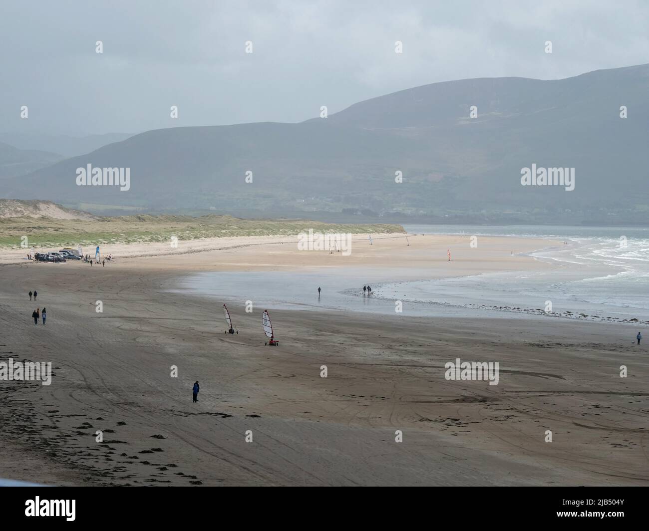 The sandy beach at Inch Beach on Dingle Bay is a popular destination ...