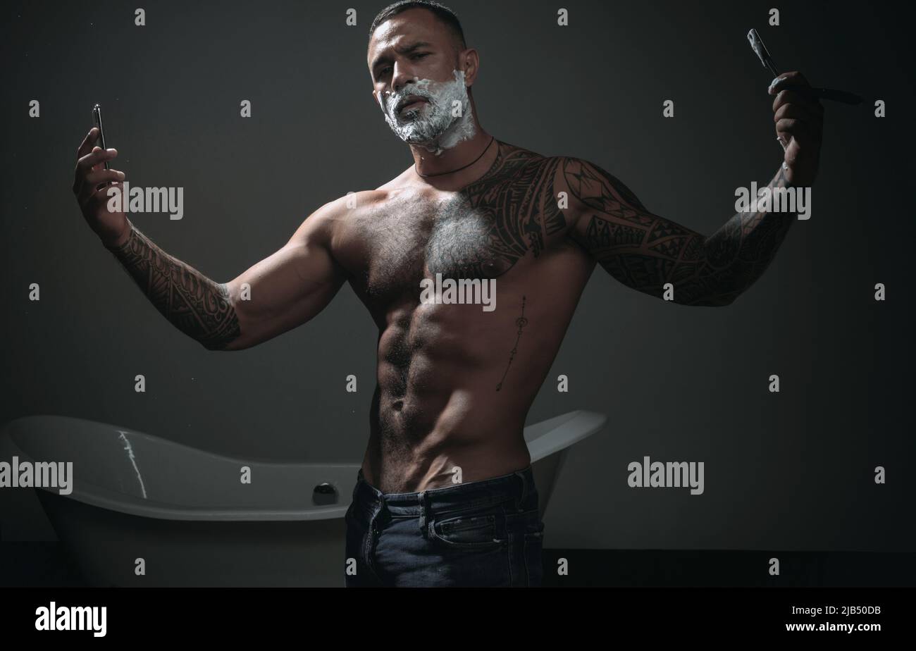 Master hairdresser does hairstyle and style with scissors and comb ...