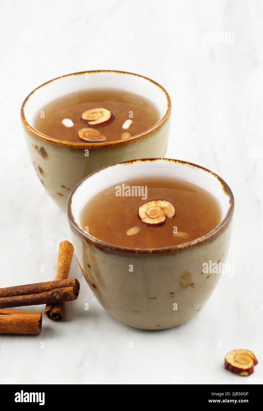 Sujeonggwa, Korean Traditional Cinnamon Punch. Dark Reddish Brown in ...