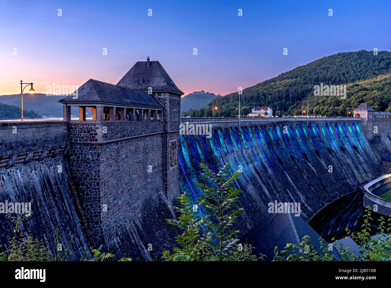 Dam in the evening light, illuminated in blue, dam wall of Edersee ...