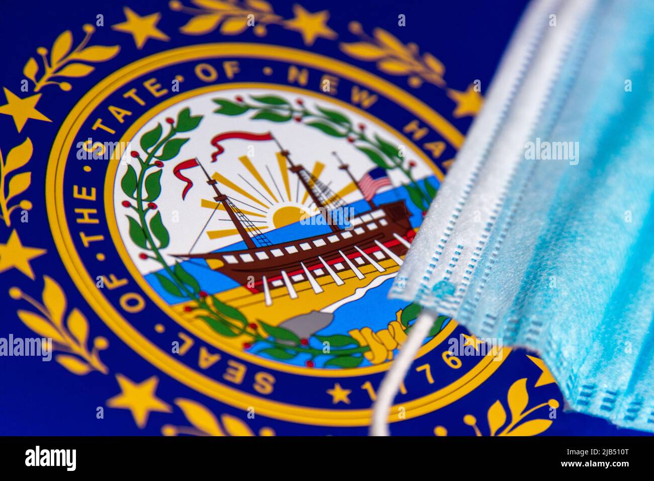 Facial Mask on Flag and seal of New Hampshire. Several communities in ...