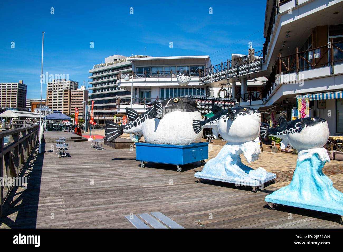 Fugu puffer fish monuments & Kamon Wharf in sunny day. Shimonoseki is ...