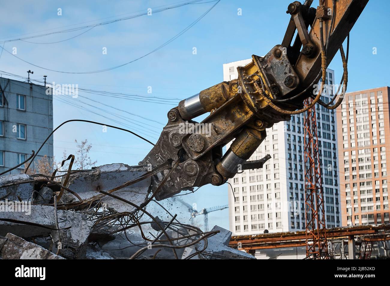 Hydraulic concrete crusher breaks and crushes reinforced concrete Stock ...