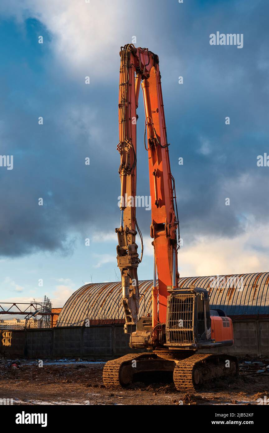 Special excavator destroyer with scissors at demolition site Stock ...