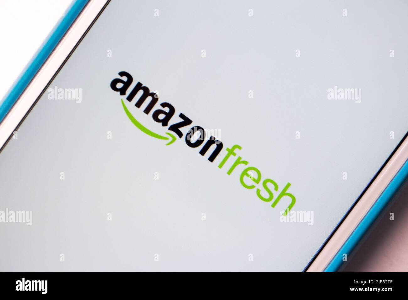 Logo of Amazon Fresh, a grocery delivery service, on iPhone ...