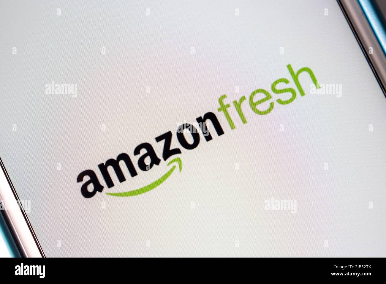 Logo of Amazon Fresh, a grocery delivery service, on iPhone ...