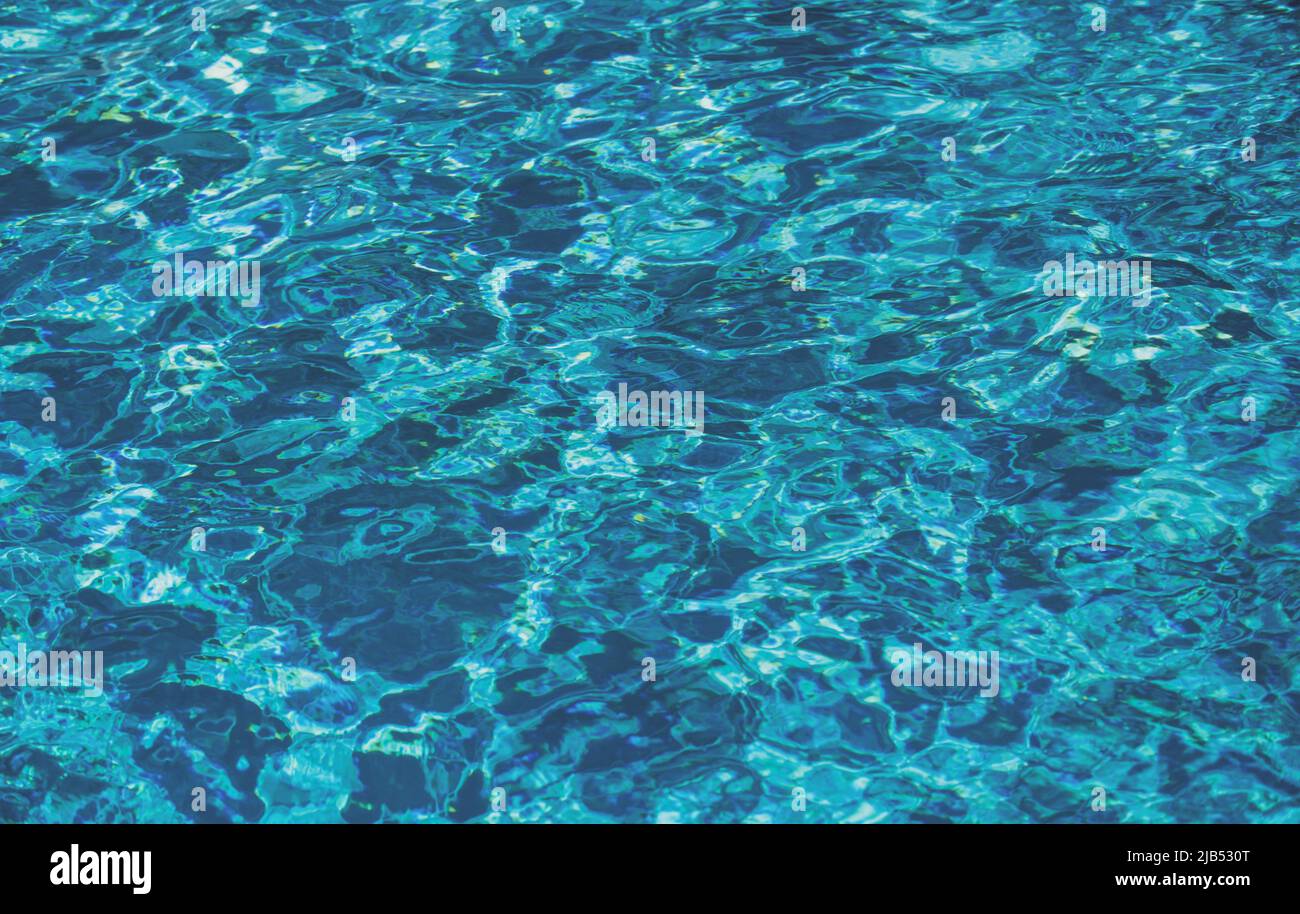 Abstract ripple wave and clear turquoise water surface in swimming pool ...