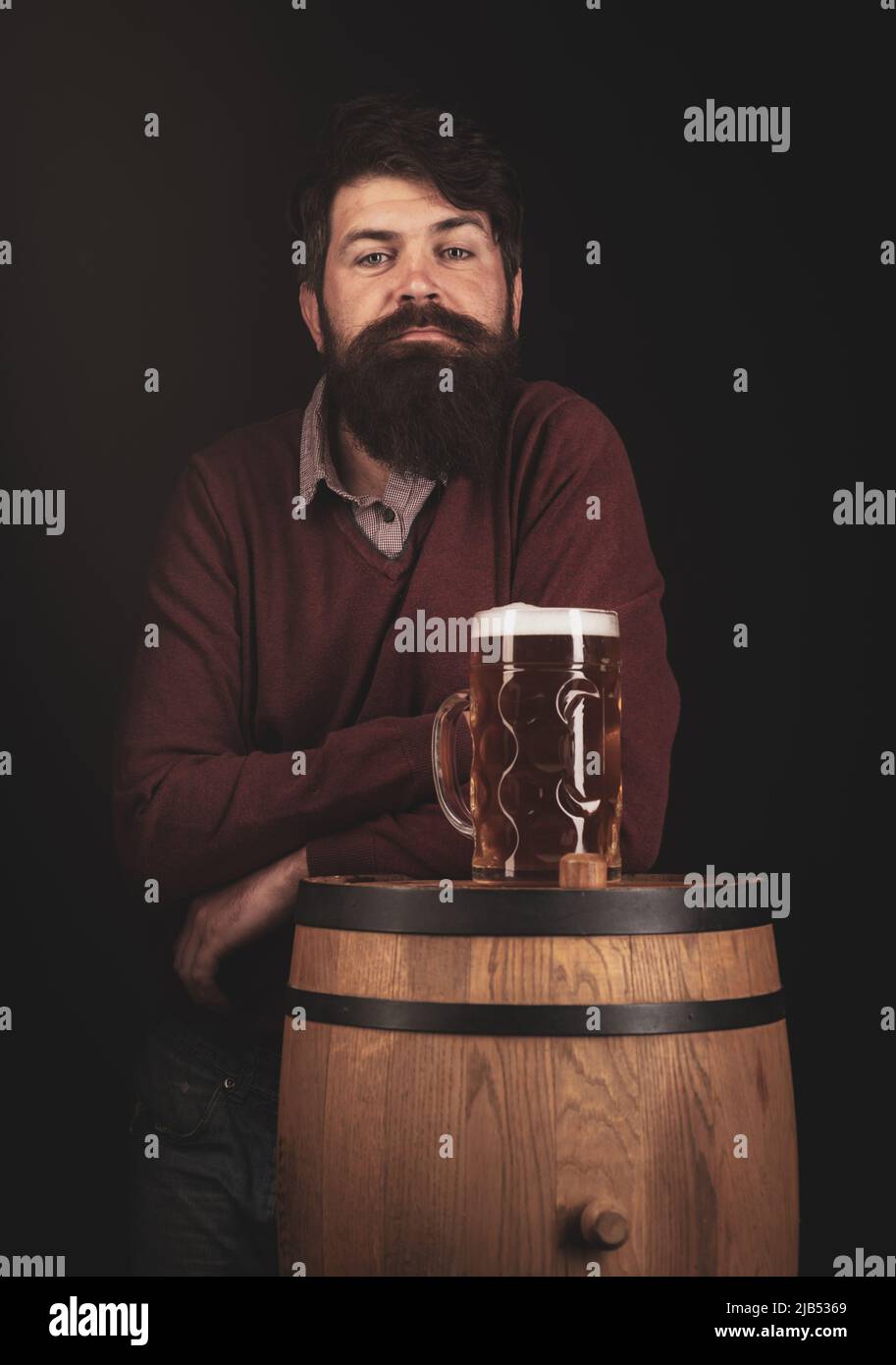 Bearded man with a glass of beer. Concept of craft beer. Man with beer ...